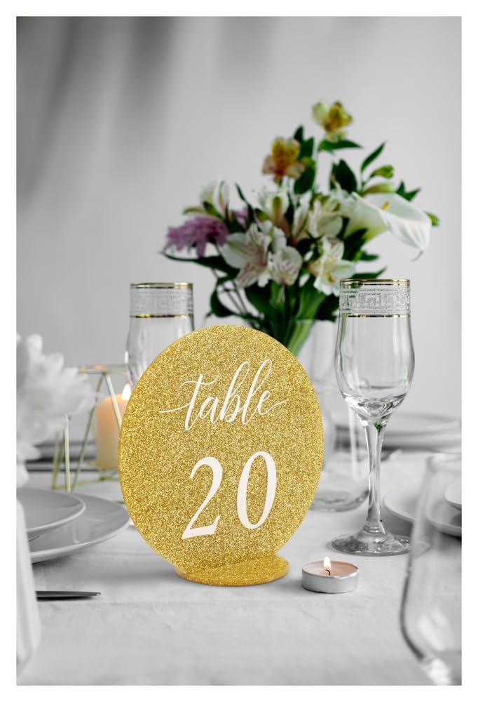 Gold glitter table numbers for wedding | Beachweddingtips.com