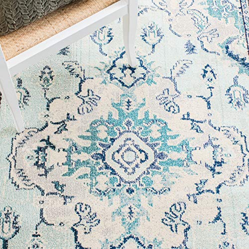SAFAVIEH Monaco Collection Area Rug - 6'7" x 9'2", Light Blue & Ivory ...