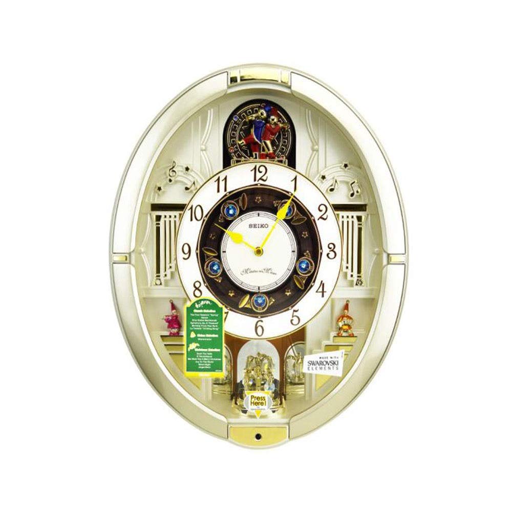 Amazon.co.jp： セイコー クロック 掛け時計 電波 アナログ からくり 40曲 メロディ 回転飾り 薄金色 パール RE578B ...