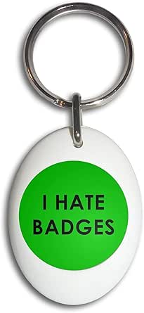 I Hate Badges - White Plastic Oval Key Ring at Amazon Men’s Clothing store