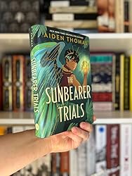Amazon.com: The Sunbearer Trials (The Sunbearer Duology, 1): 9781250822130: Thomas, Aiden: Books