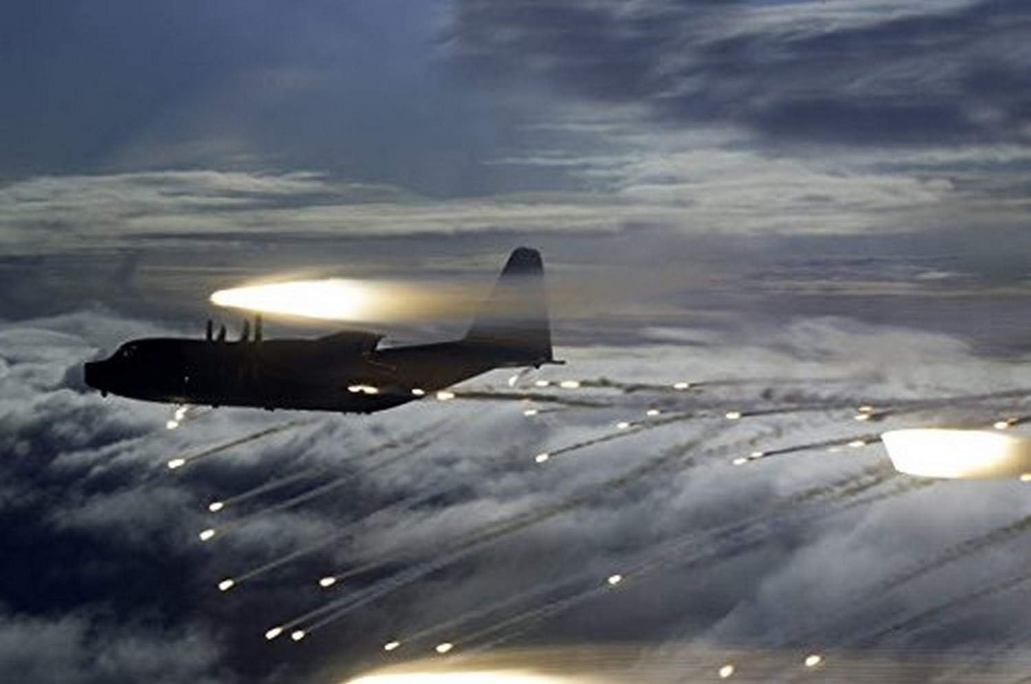 Amazon.com: MC-130P Combat Shadow dropping flares Poster Print by Gert ...