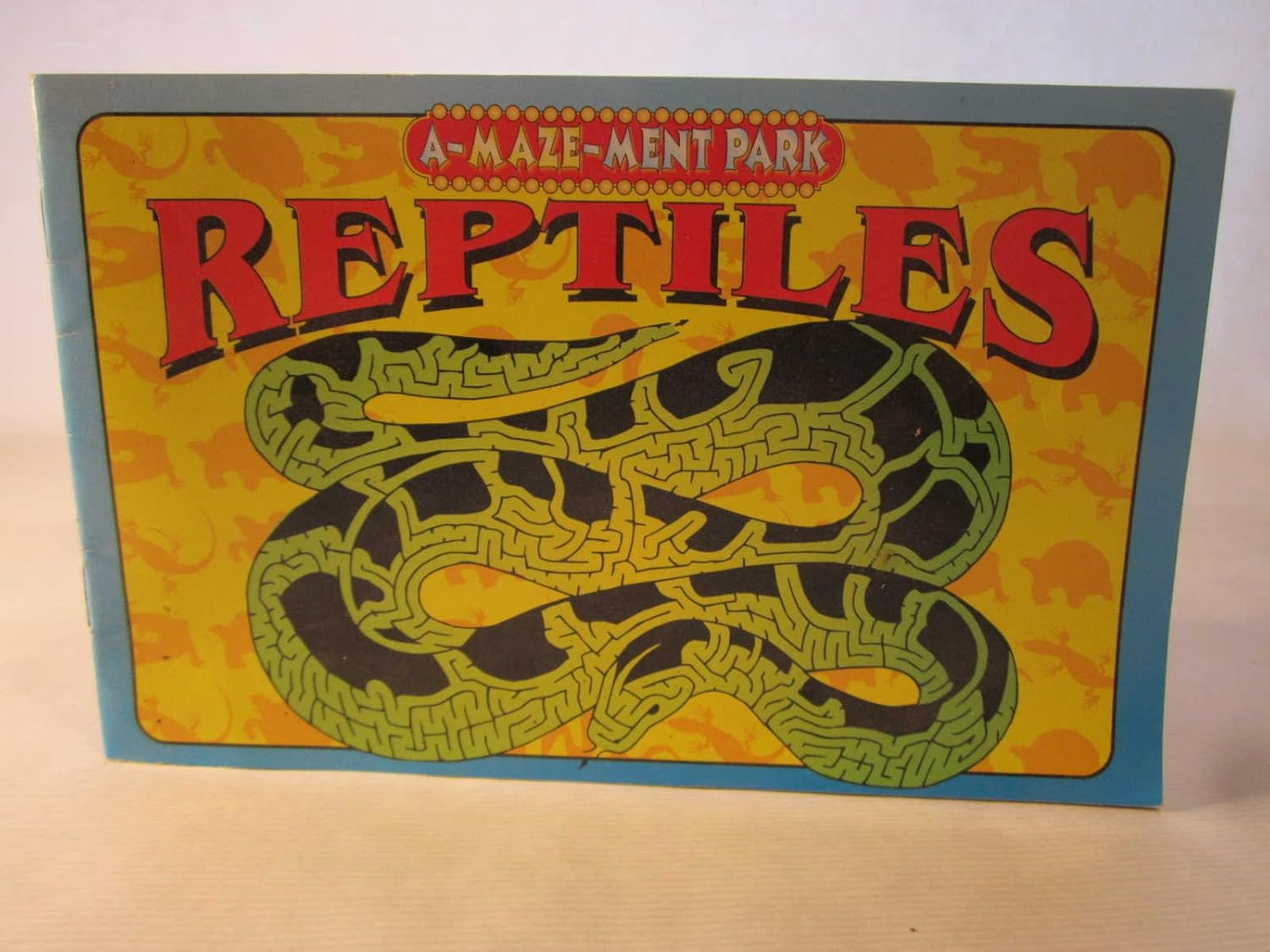 a-maze-ment park reptiles: woodruff, paul: Amazon.com: Books