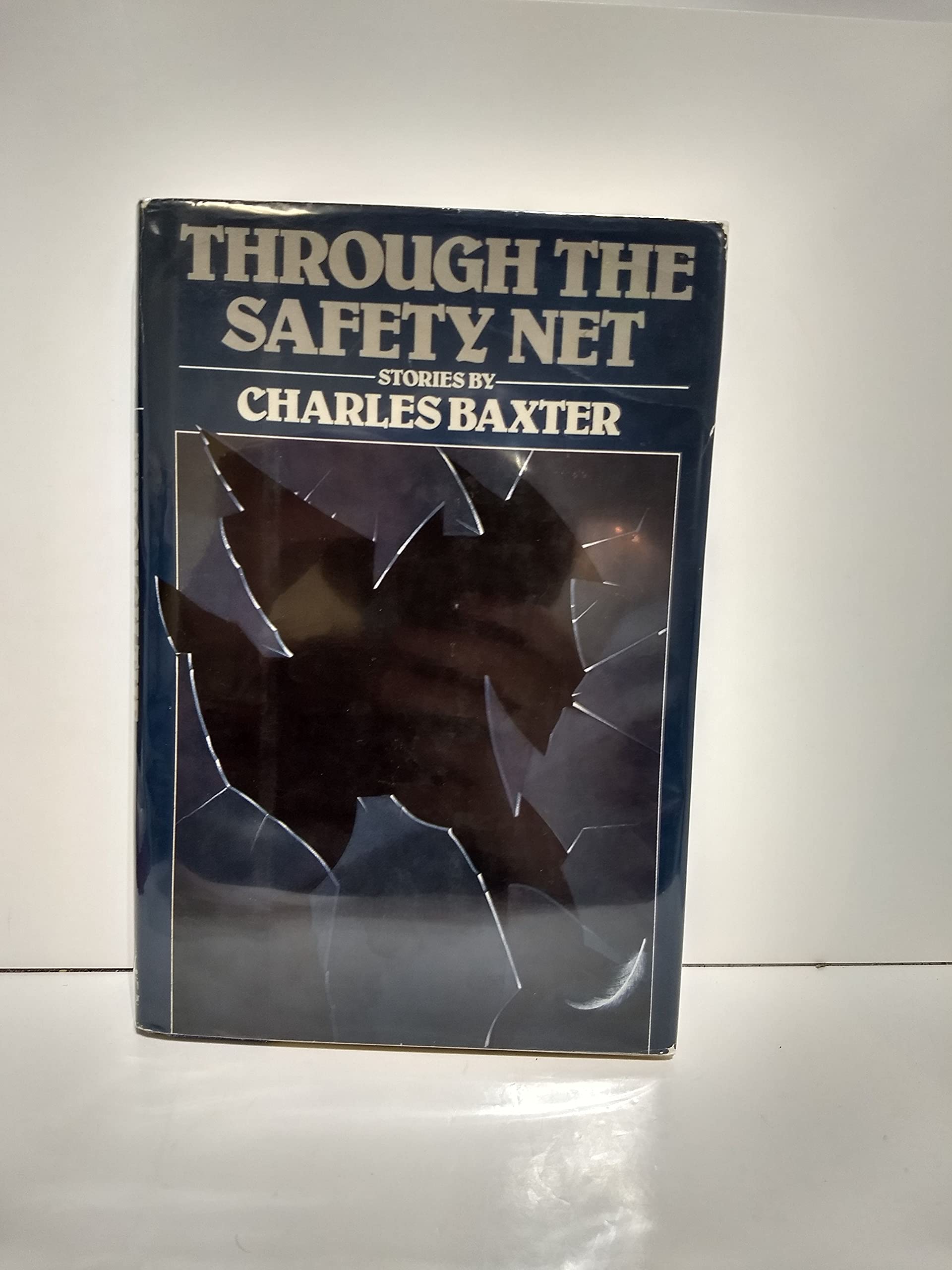 Through the Safety Net: Baxter, Charles: 9780670804771: Amazon.com: Books