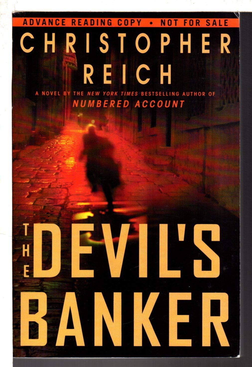 Amazon.com: The Devil's Banker: 9780385337274: Reich, Christopher: Books
