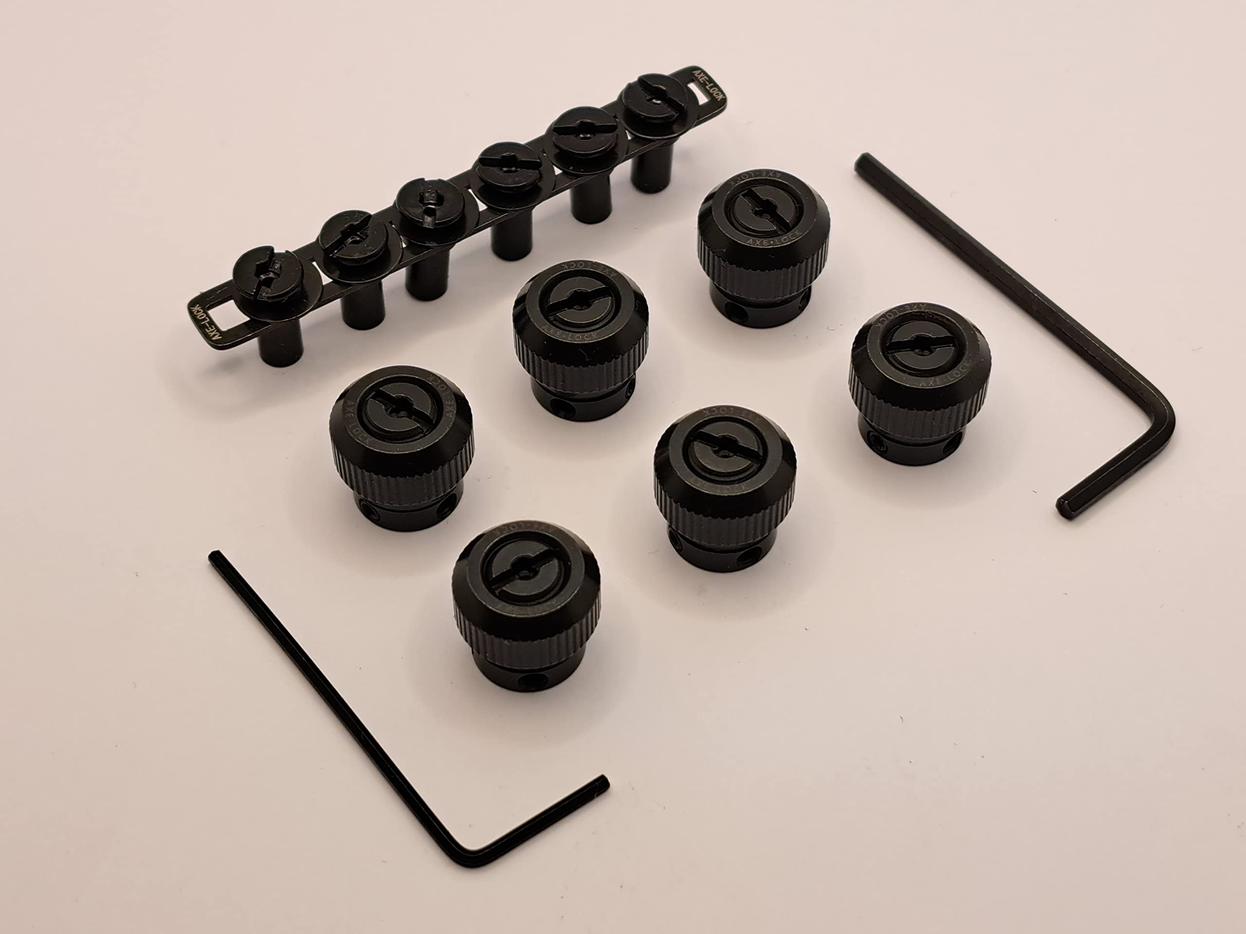 AXE-LOCK - STRINGS LOCKING SYSTEM (BLACK) : Amazon.co.uk: Musical ...