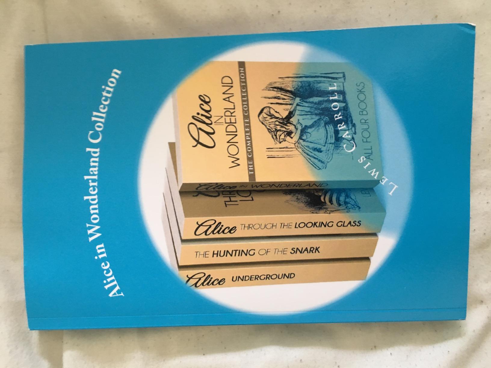 Alice in Wonderland Collection: All Four Books: Amazon.co.uk: Carroll ...