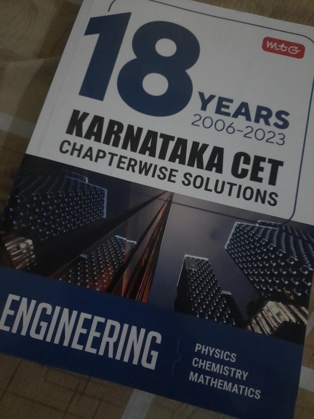 MTG 18 Years Karnataka CET Chapterwise Solutions Physics, Chemistry ...