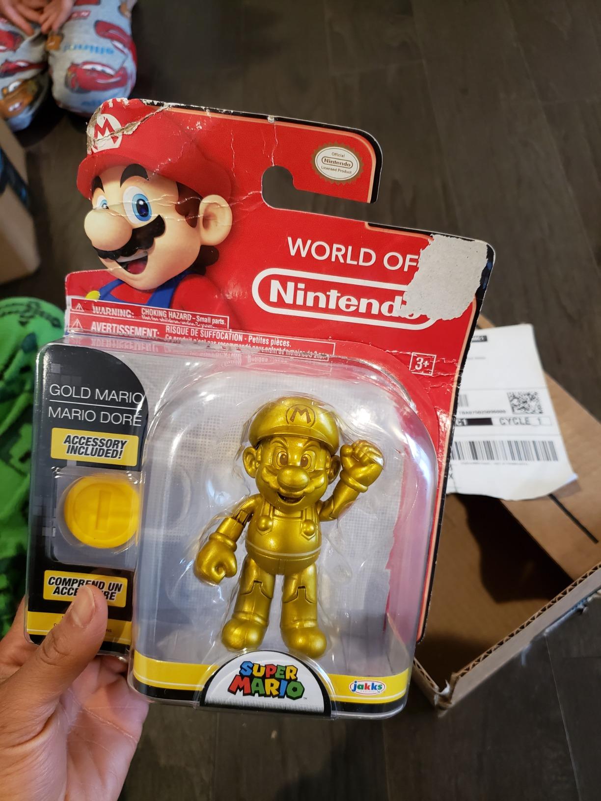 Amazon.com: World of Nintendo 91447 4" Gold Mario Action Figure : Toys ...