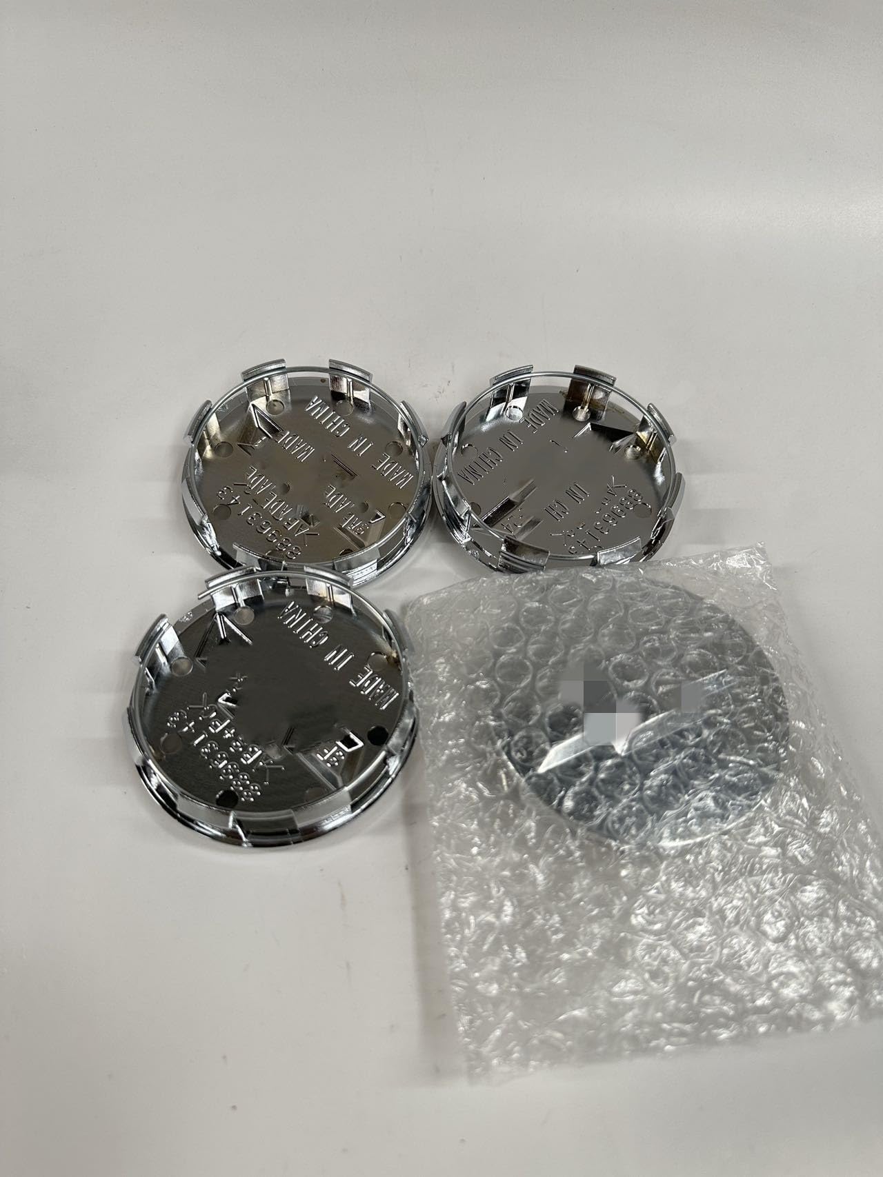 Amazon.com: GMC OEM New Wheel Hub Center Cap Black w/Silver Bowtie Logo ...