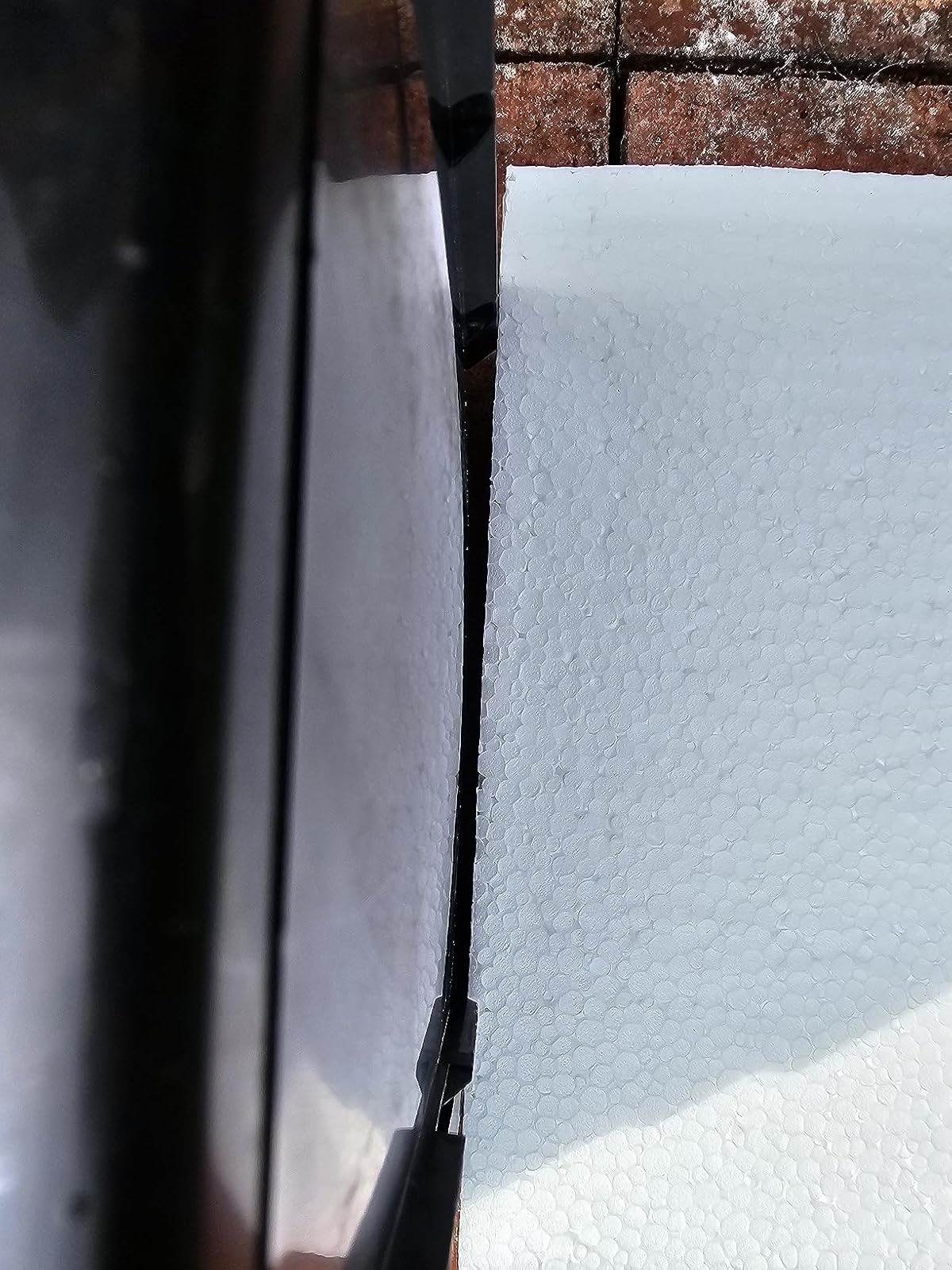 Swollen side plates on a new battery