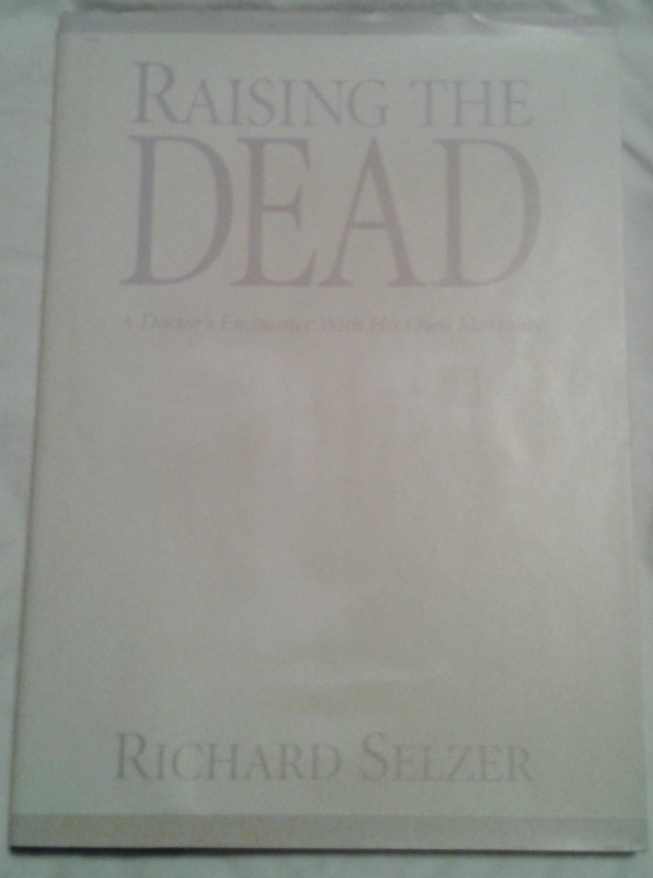 Raising the Dead: Selzer, Richard: 9781879736115: Amazon.com: Books