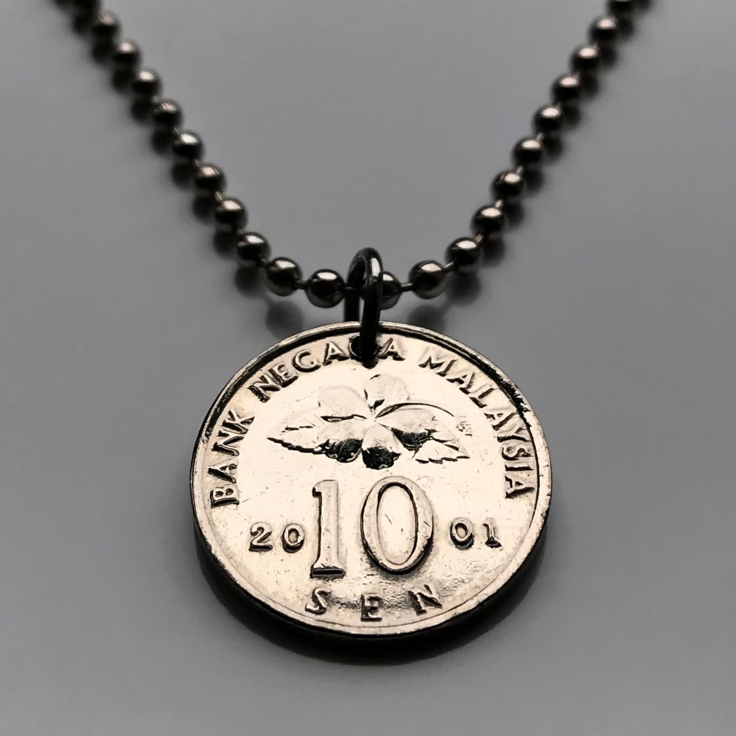 2001 Malaysia 10 Sen coin pendant Malay Congkak game board mancala Hibiscus flower Kuala Lumpur ...