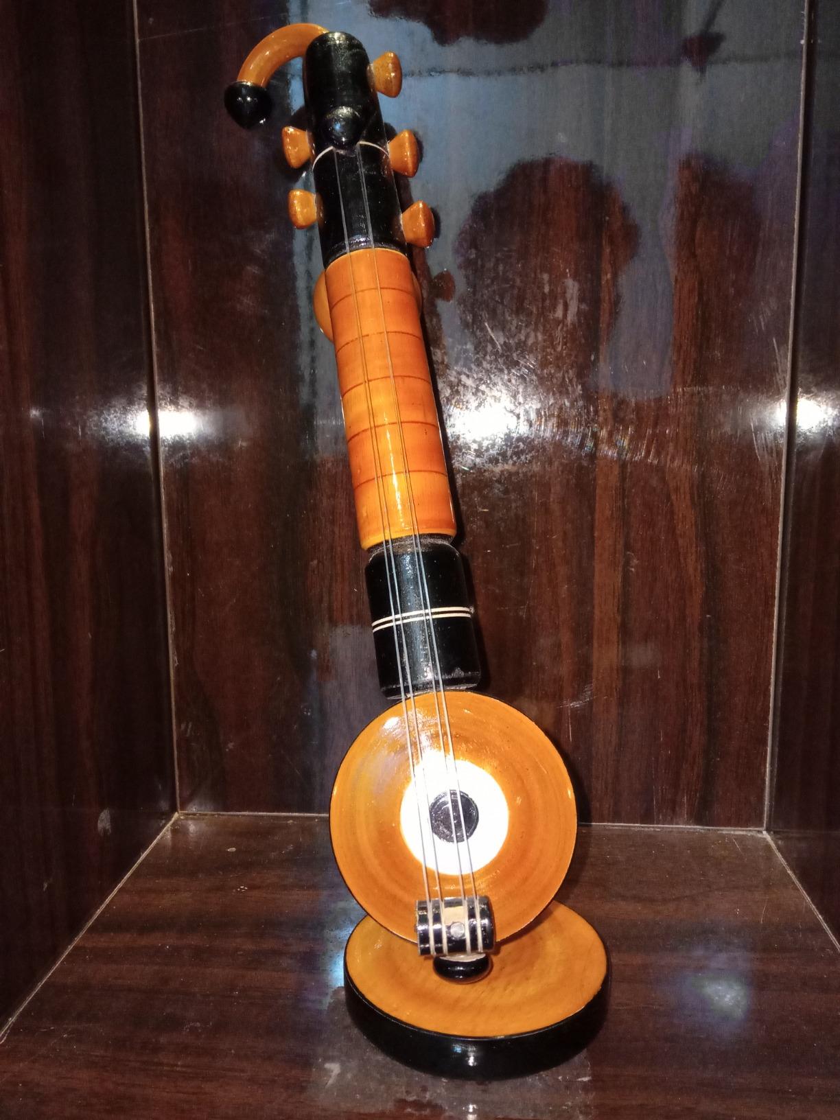 Buy SGNS Eucalyptus Wooden Veena Home Decor Showpiece Online at Low ...