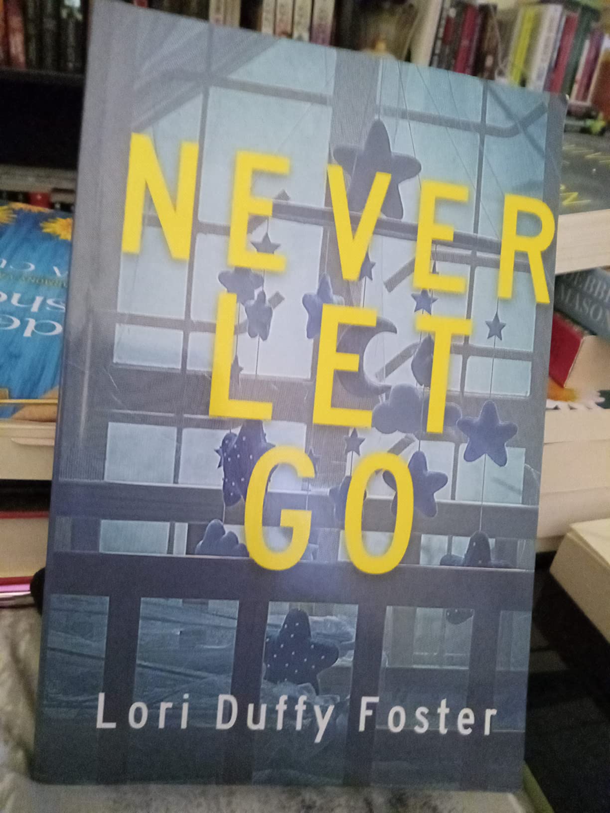 Amazon.com: Never Let Go eBook : Foster, Lori Duffy: Books