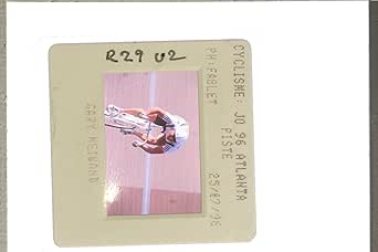 Amazon.com: Slides photo of Gary Neiwand, during event.