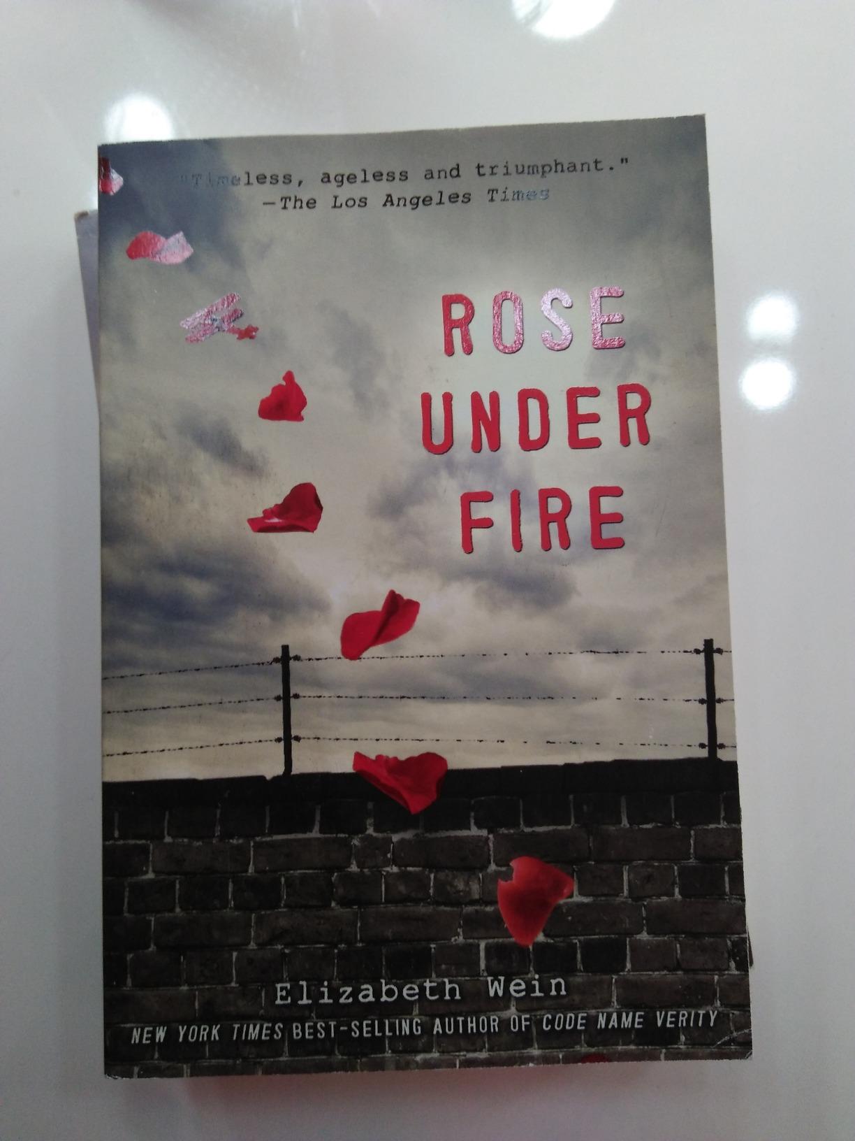 Rose Under Fire : Elizabeth Wein: Amazon.in: Books