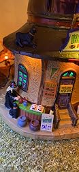 Amazon.com: Lemax Village Collection Helga's Hats, B/O (4.5V) #15794 ...
