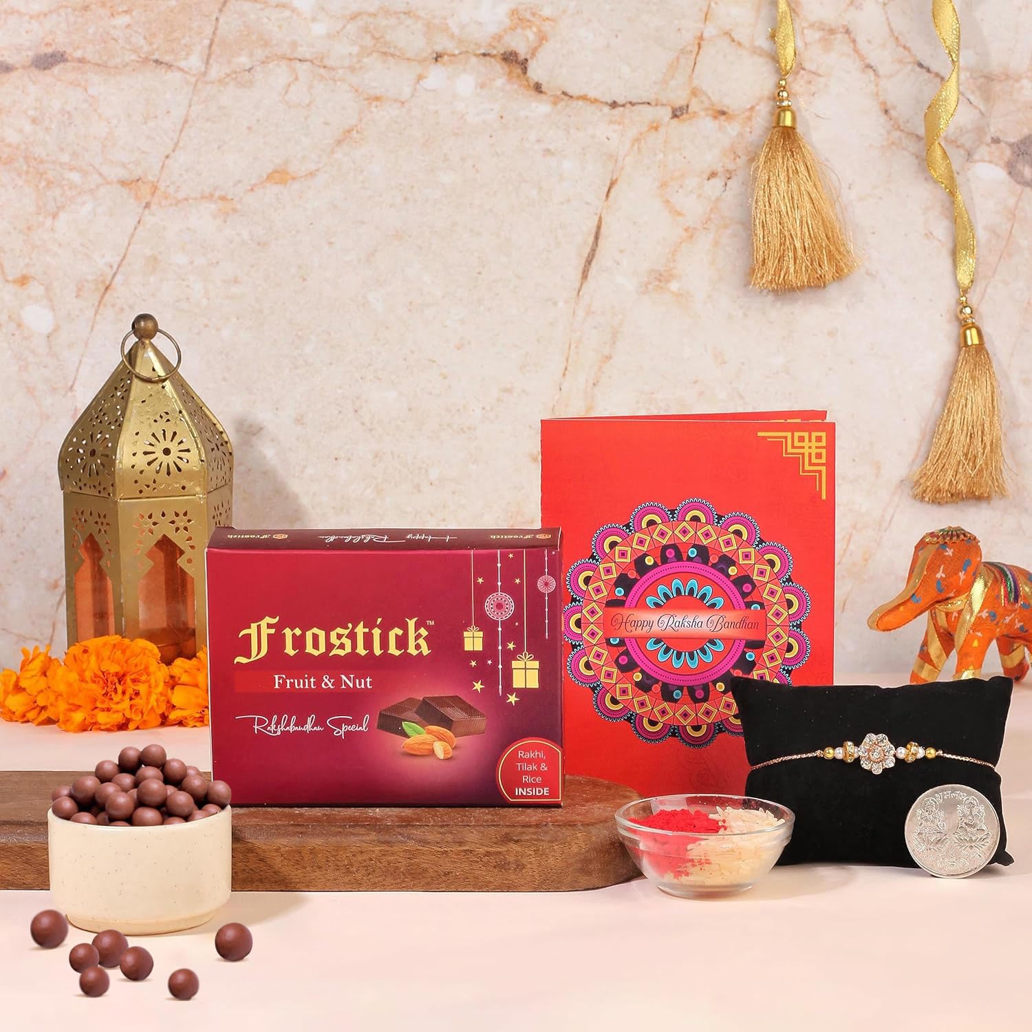Frostick Designer Rakhi With Chocolate Coated Nuts For brother ...