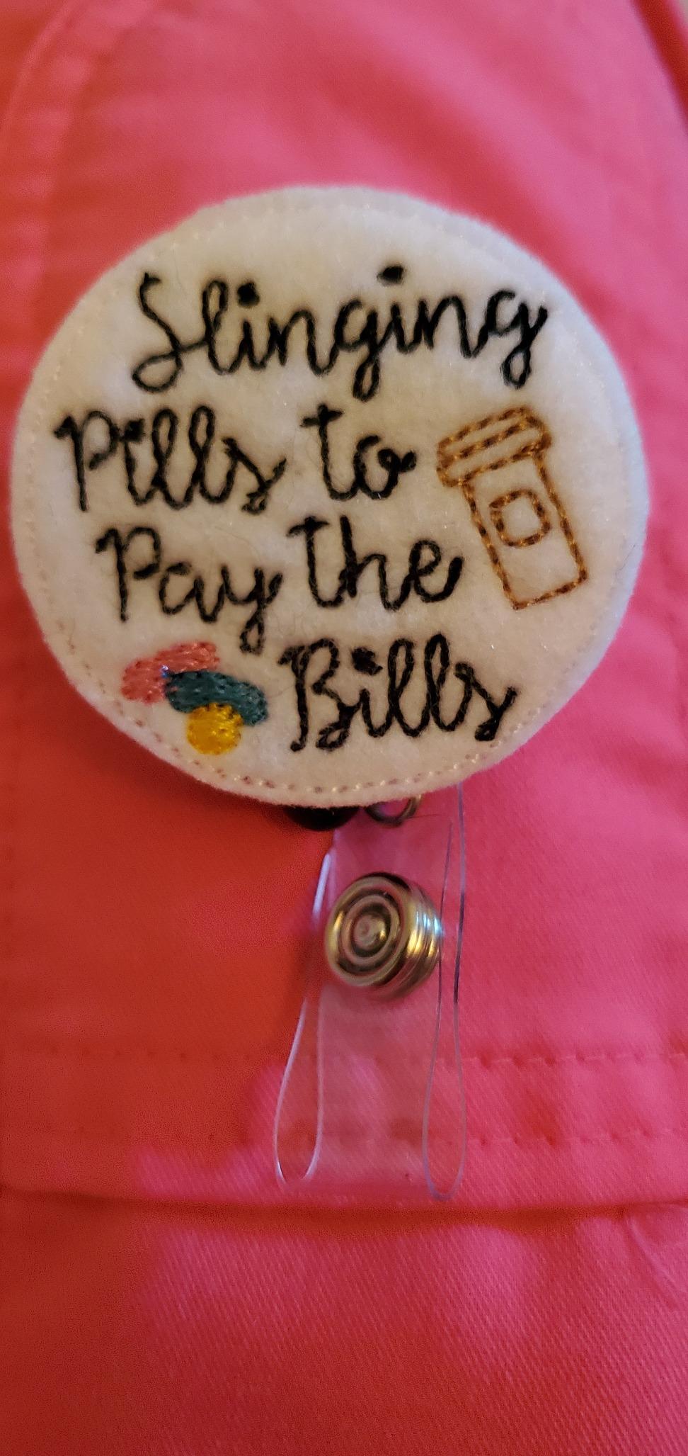 Amazon.com: Slinging Pills To Pay The Bills Badge Reel Retractable ...
