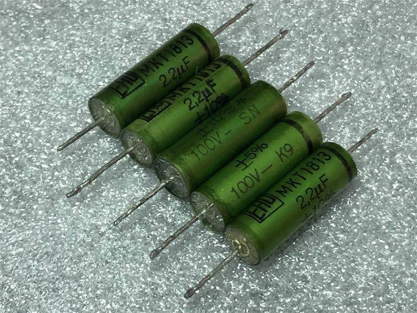 Radial capacitor MKT1813 is a 2.2UF 100V Transparent Head Frequency ...