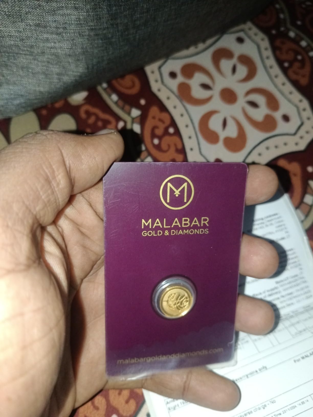 Malabar Gold & Diamonds 24K Gold Coin