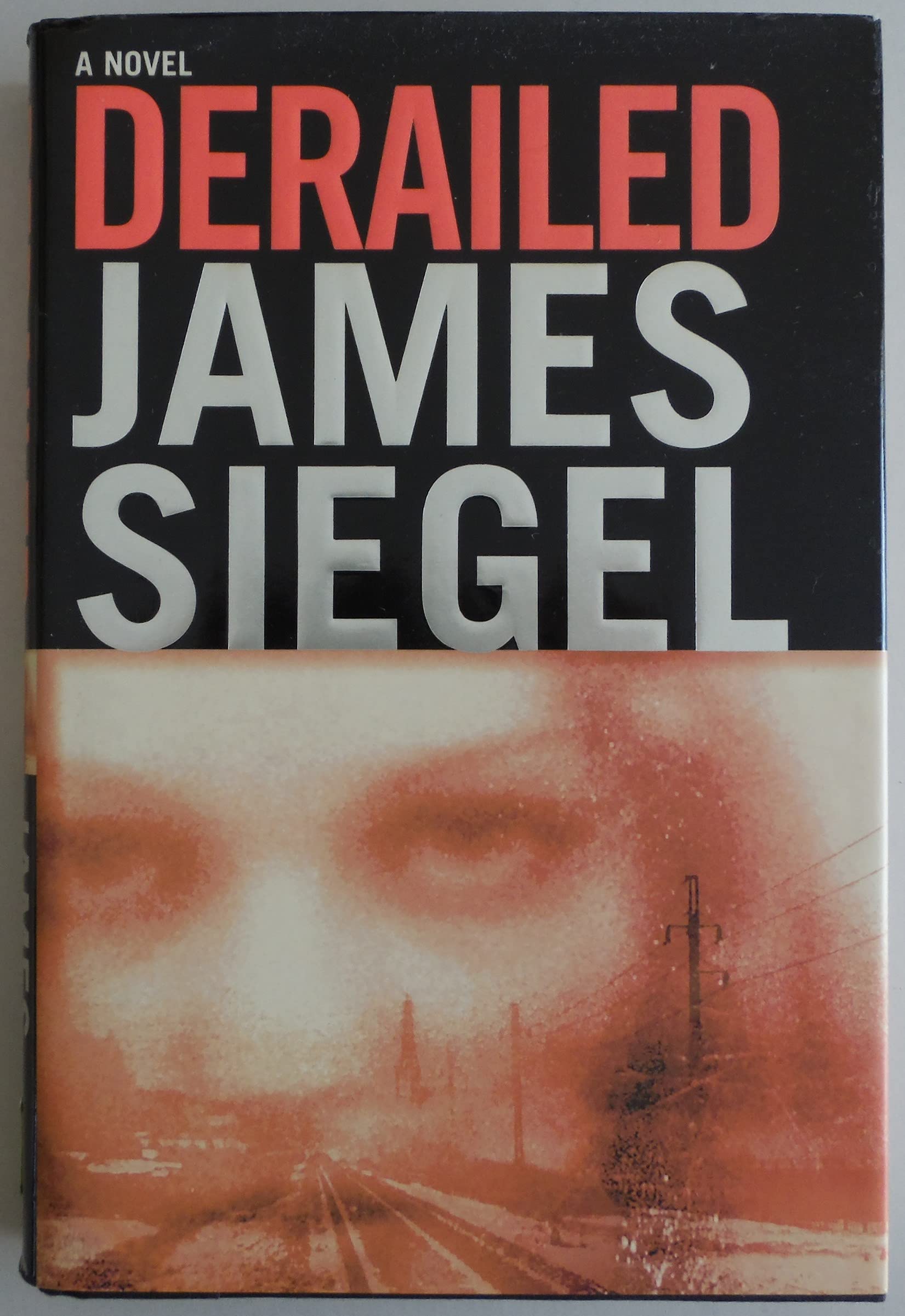 Amazon.com: Derailed: 9780446531580: Siegel, James: Books