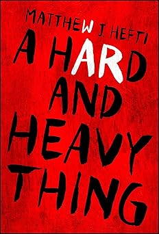 A Hard And Heavy Thing: Hefti, Matthew J: 9781440591884: Amazon.com: Books