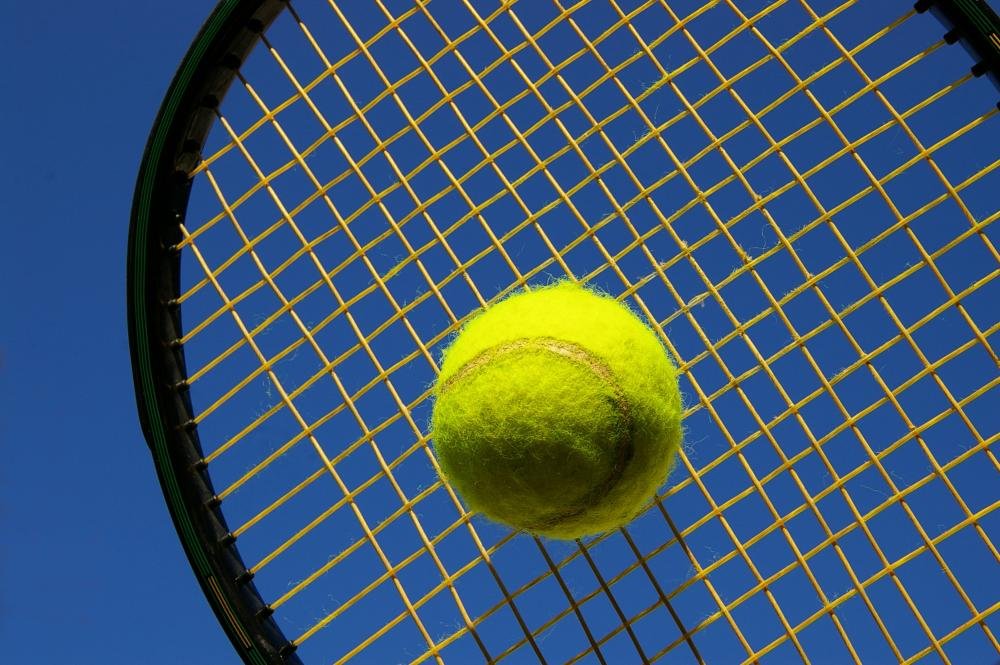 Tennis Racket Hitting Ball