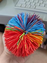 Amazon.com: 4.5Inch Large Rainbow Stringy Ball Silicone Bouncing Fluffy ...