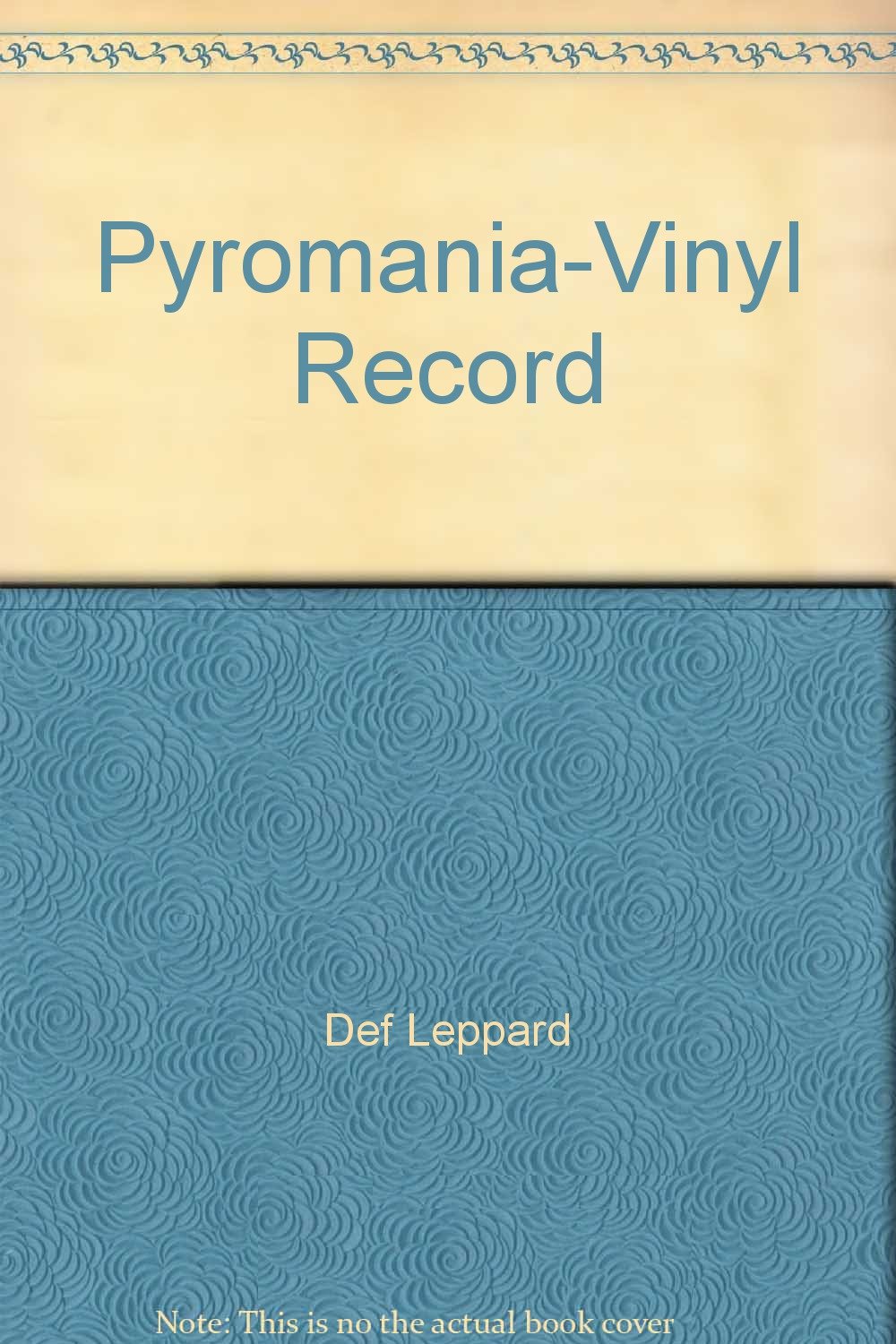 Pyromania-Vinyl Record: Amazon.com: Books