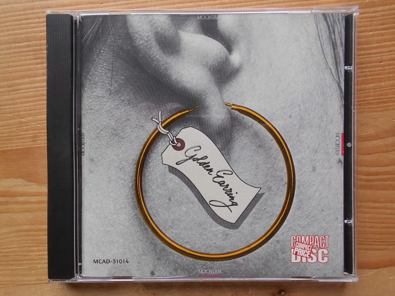 Moontan: Golden Earring: Amazon.fr: CD et Vinyles}