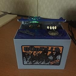 Amazon.com : Monster Dinosaur Moving Musical Electronic Chirldren Coin ...