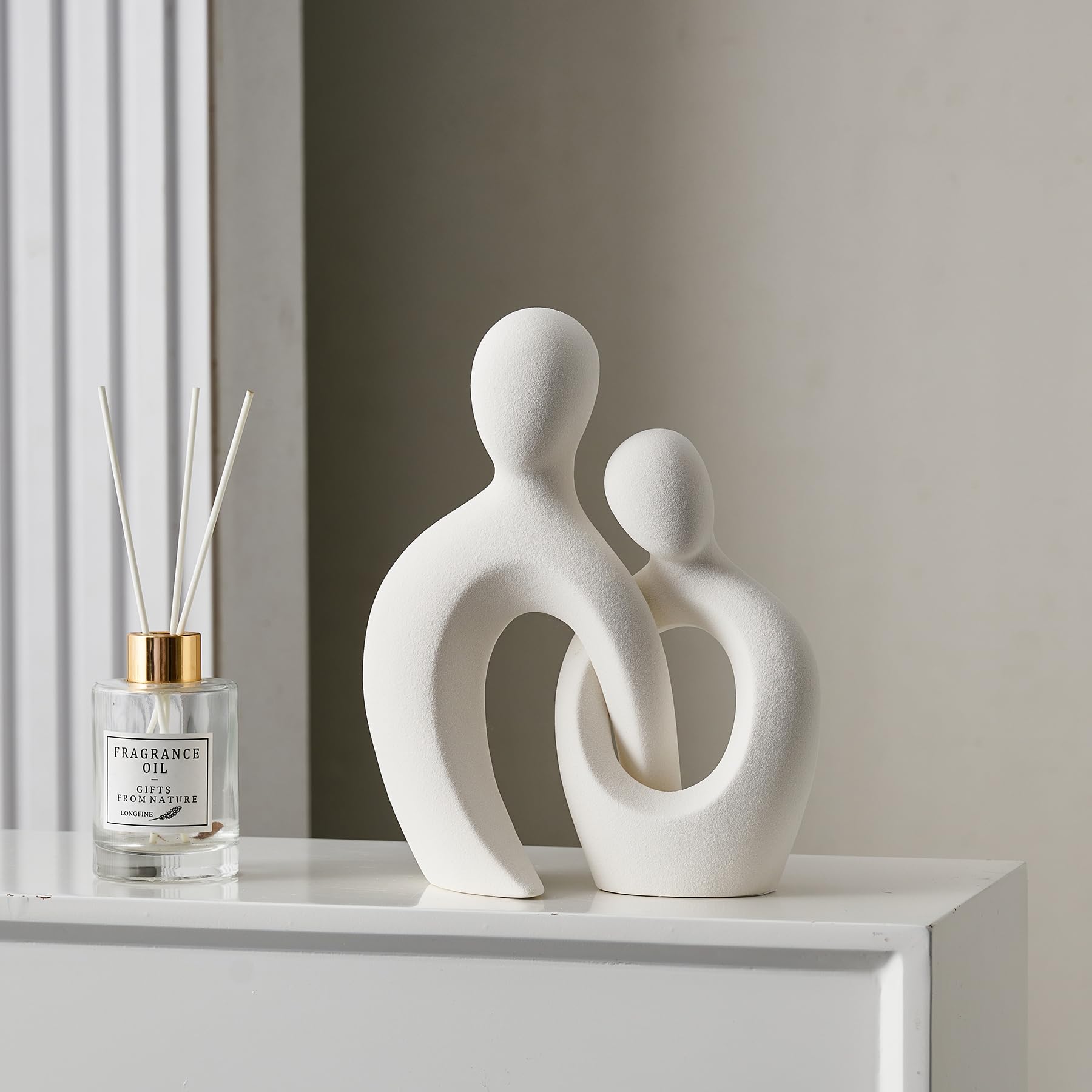 Sculpture Man And Woman Intertwined