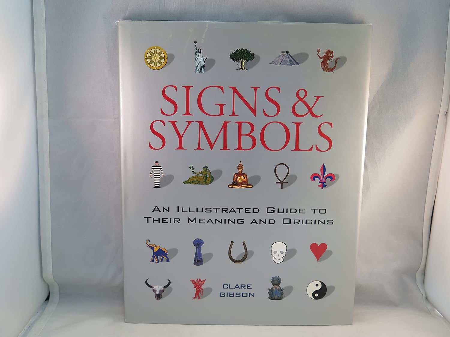 Signs & Symbols: Gibson, Clare: 9780760702178: Amazon.com: Books