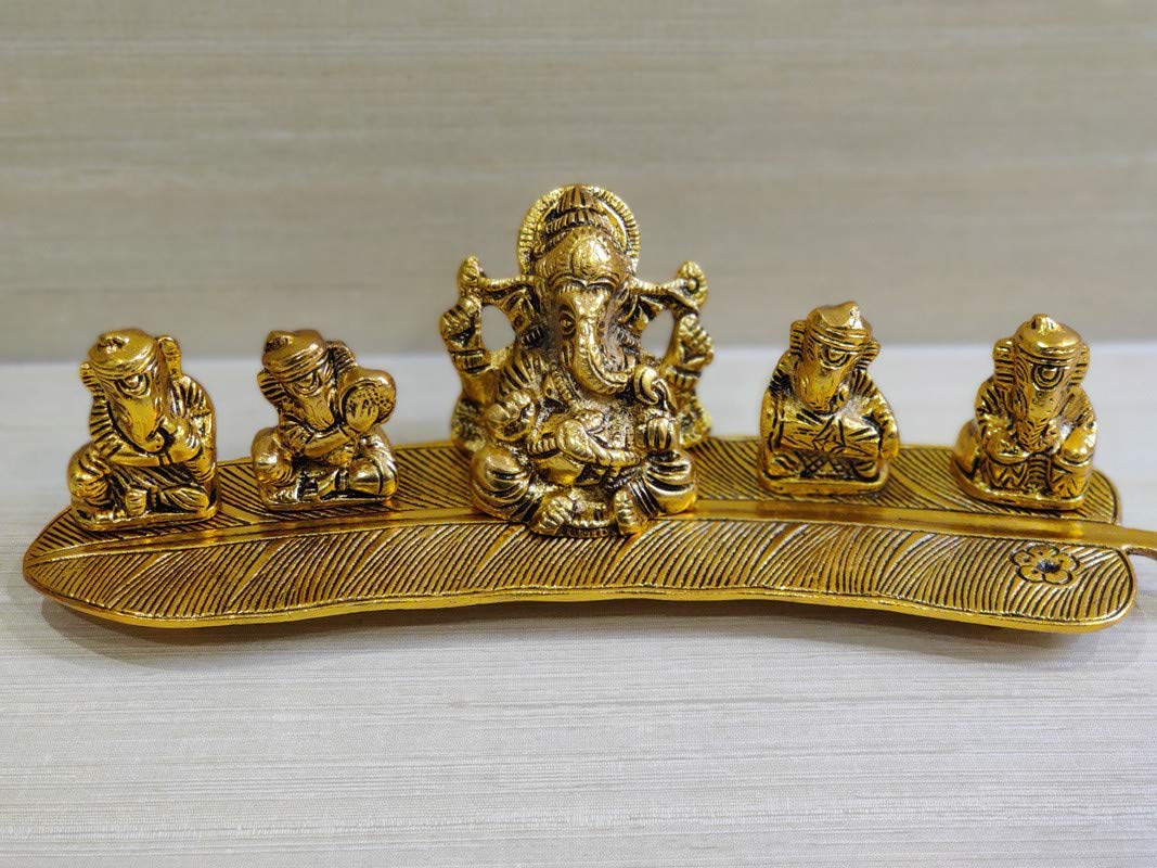 Buy White Box Metal Musical Ganesh with Instrument Set on Leaf & Diya ...