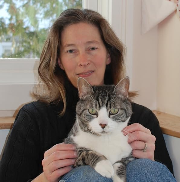 Amazon.com: Lending a Paw: A Bookmobile Cat Mystery: 9780451415462 ...