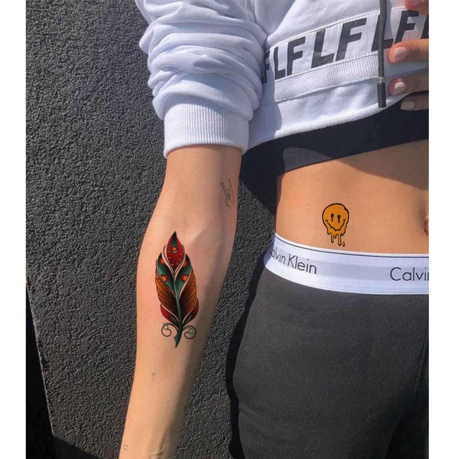 Feather Tattoo Designs On Hip