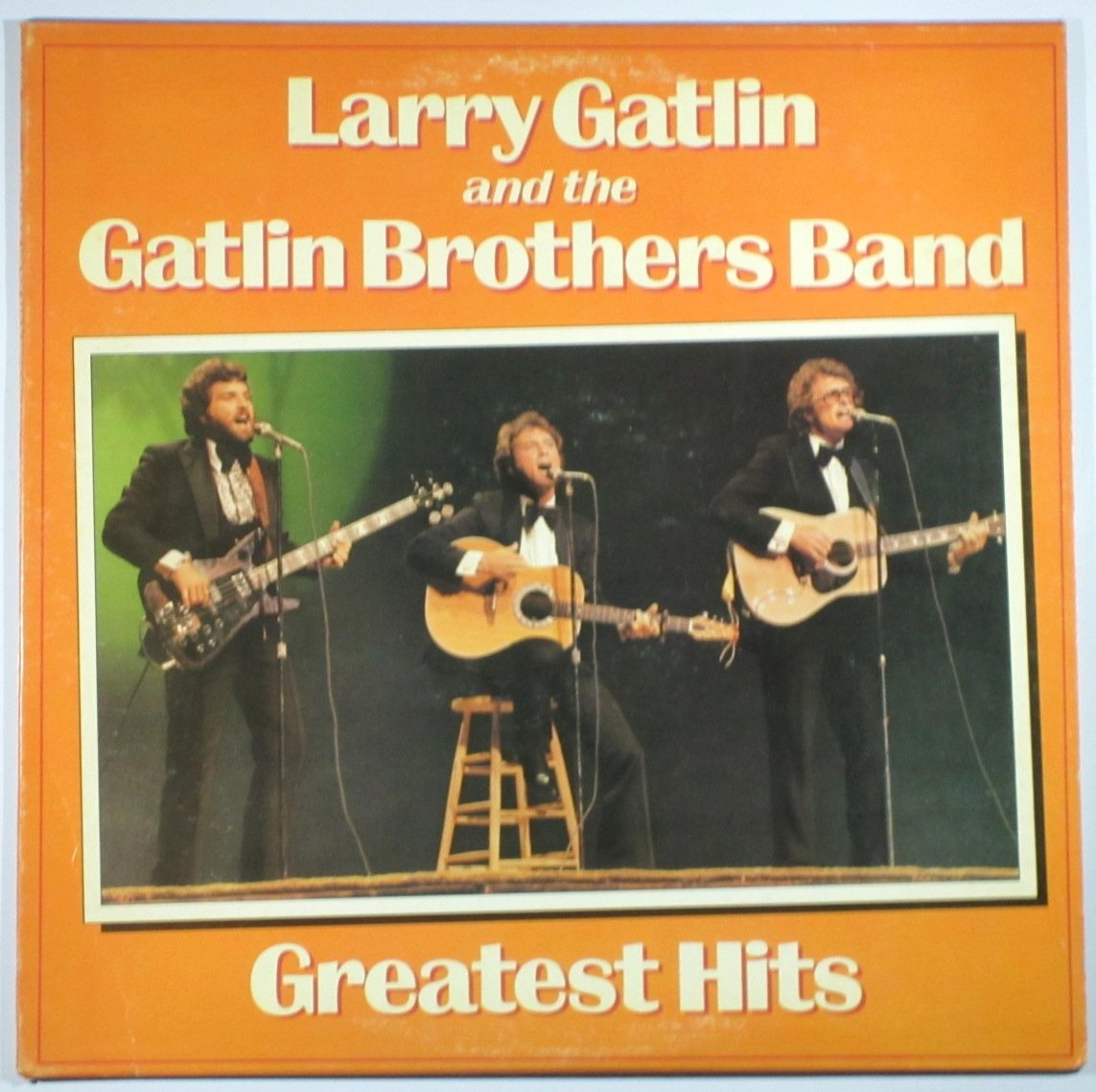 Amazon.com: LARRY GATLIN AND THE GATLIN BROS BAND-GREATEST HITS: CDs ...