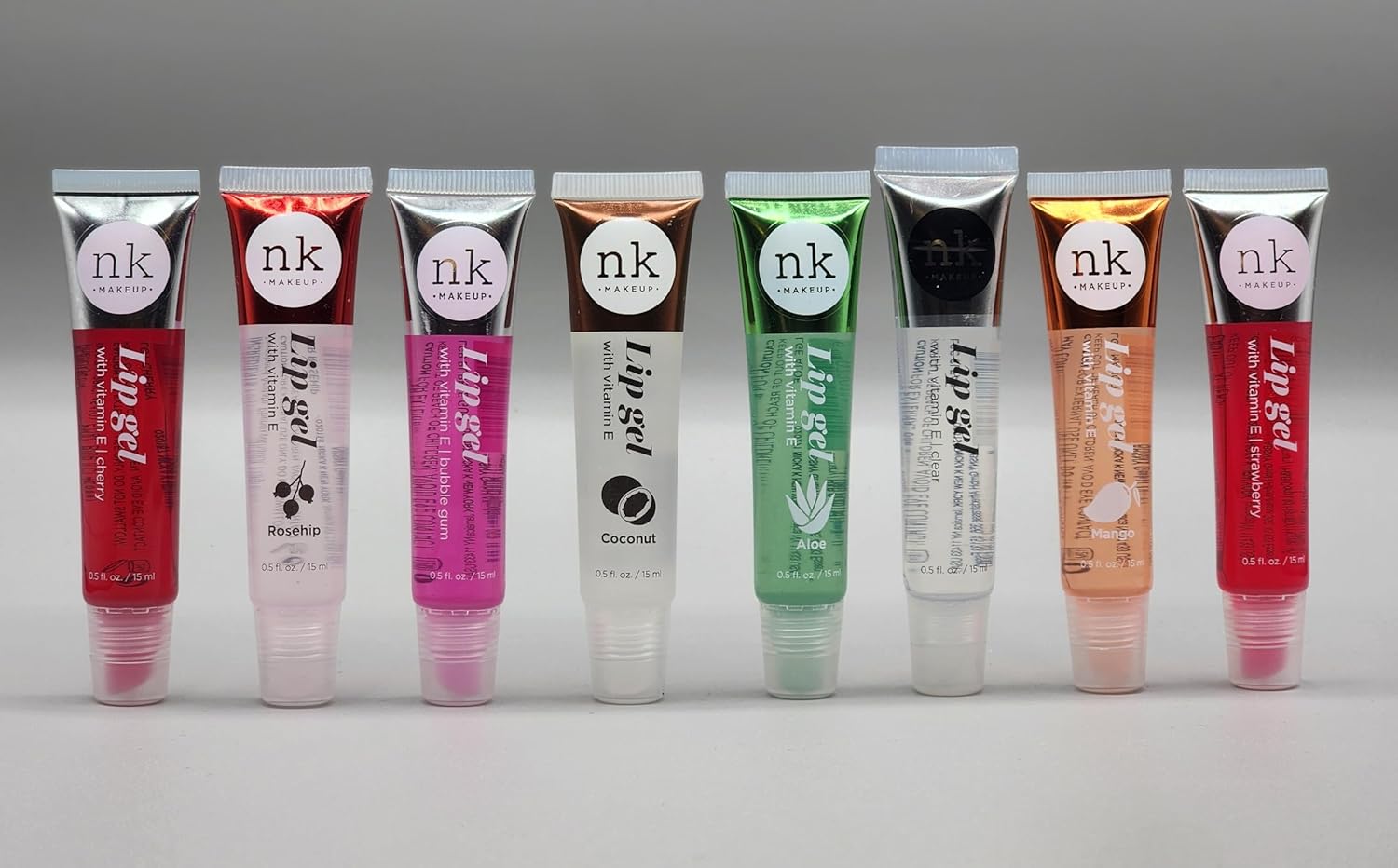 Amazon.com : VARIETY SET OF 8 NICKA-K Vitamin-E Lip Gloss (Clear ...