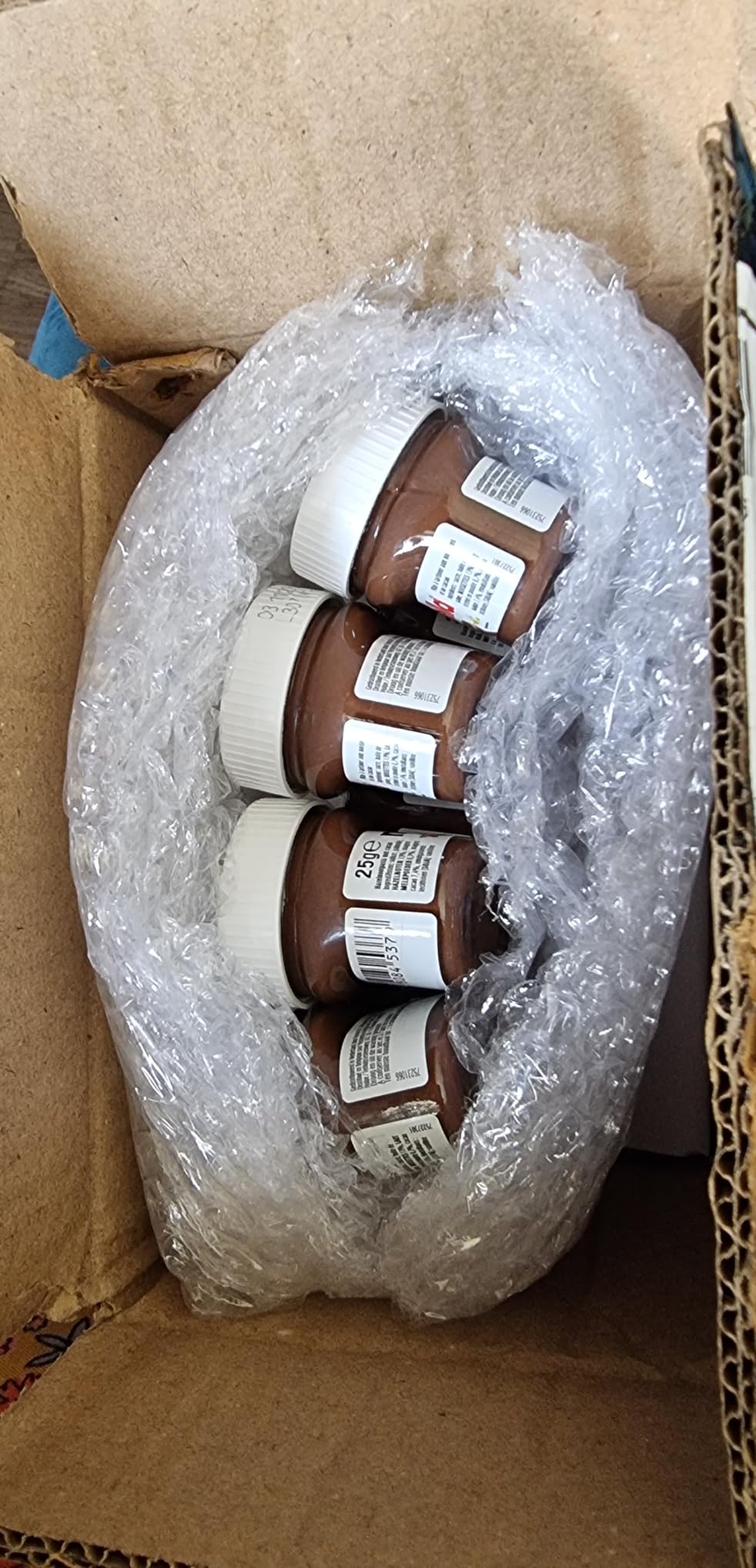 Nutella Hello World 7 Mini Bottle of Hazelnut Spread : Amazon.in ...