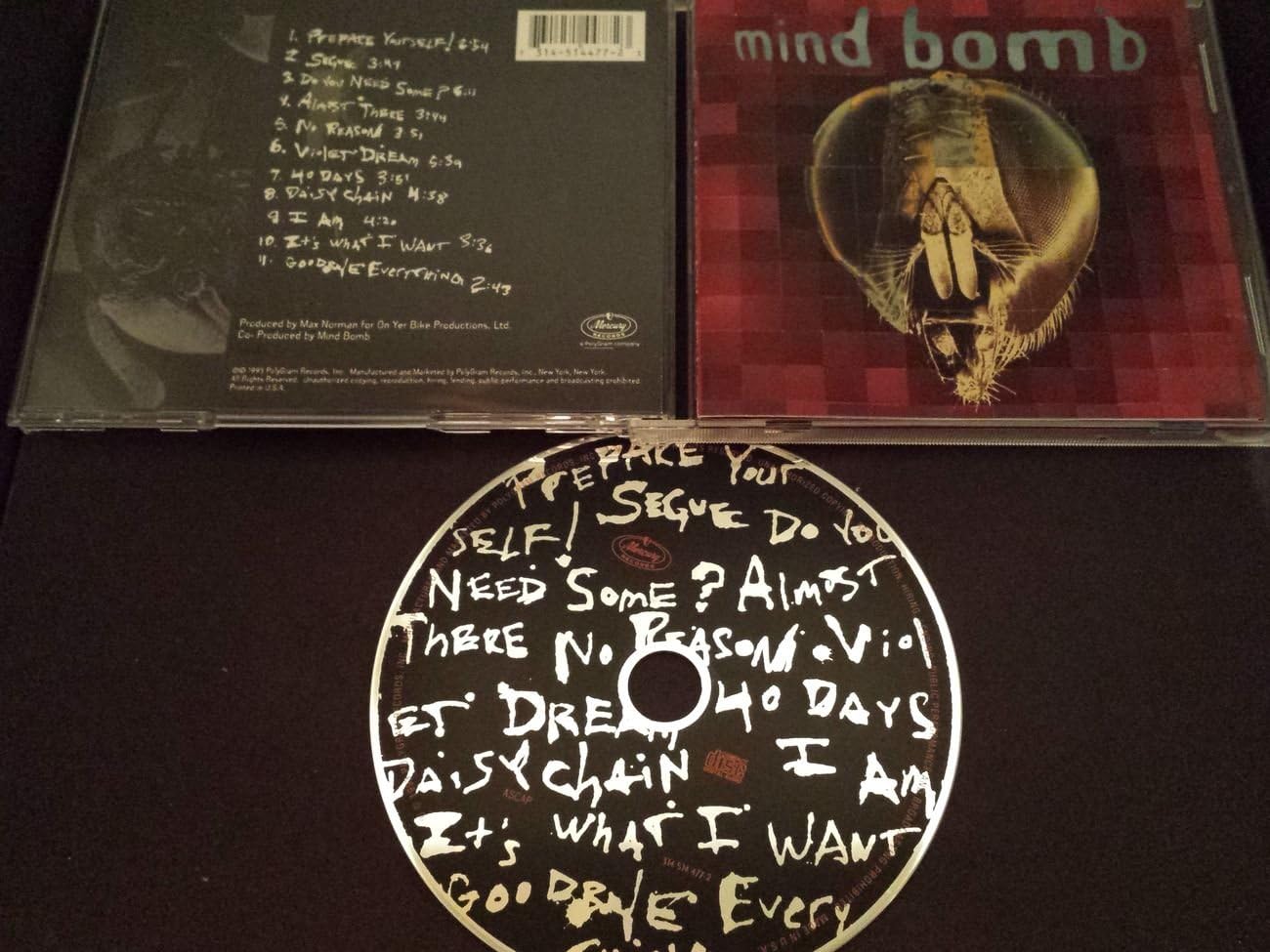 Mind Bomb: Amazon.co.uk: CDs & Vinyl