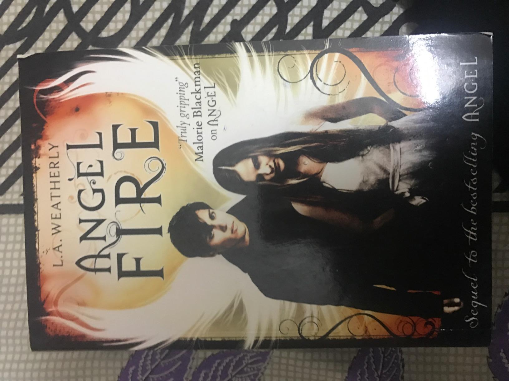 Angel Fire : Weatherly, L.A.: Amazon.in: Books