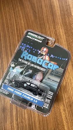 Amazon.co.jp: GREEN LIGHT ROBOCOP HOLLY WOOD MINI CAR : Home & Kitchen