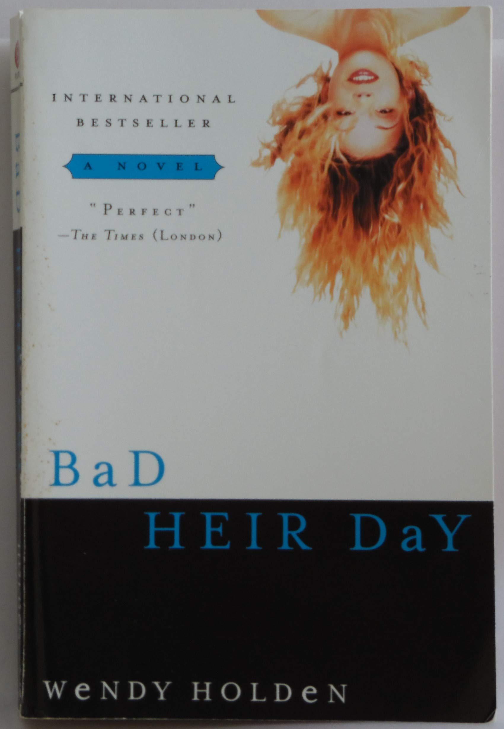 Amazon.com: Bad Heir Day: 9780452281783: Holden, Wendy: Books