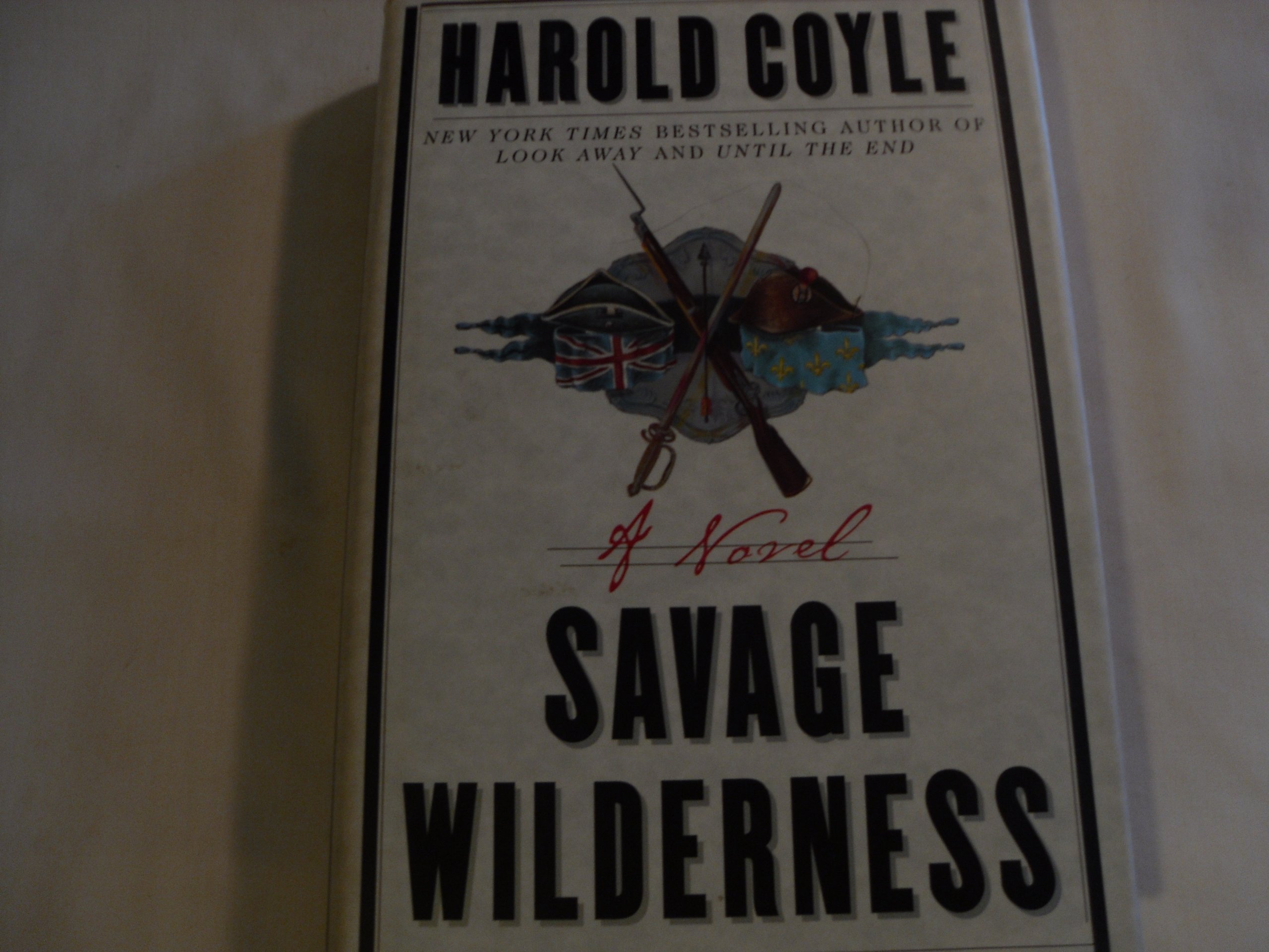 Savage Wilderness: Coyle, Harold: 9780684834337: Amazon.com: Books