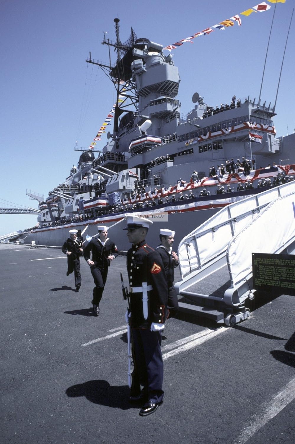 Amazon.com: Photo A Marine guards the brow of the battleship USS ...