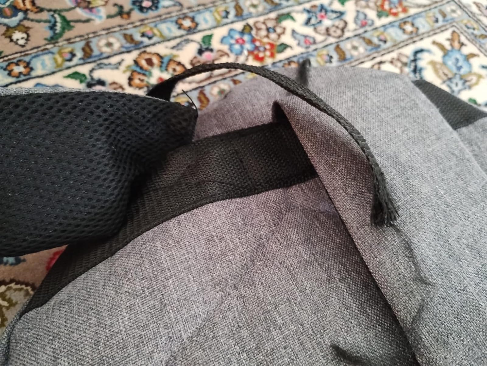 Not suitable as a bag as the handle strap stitching will fail quickly