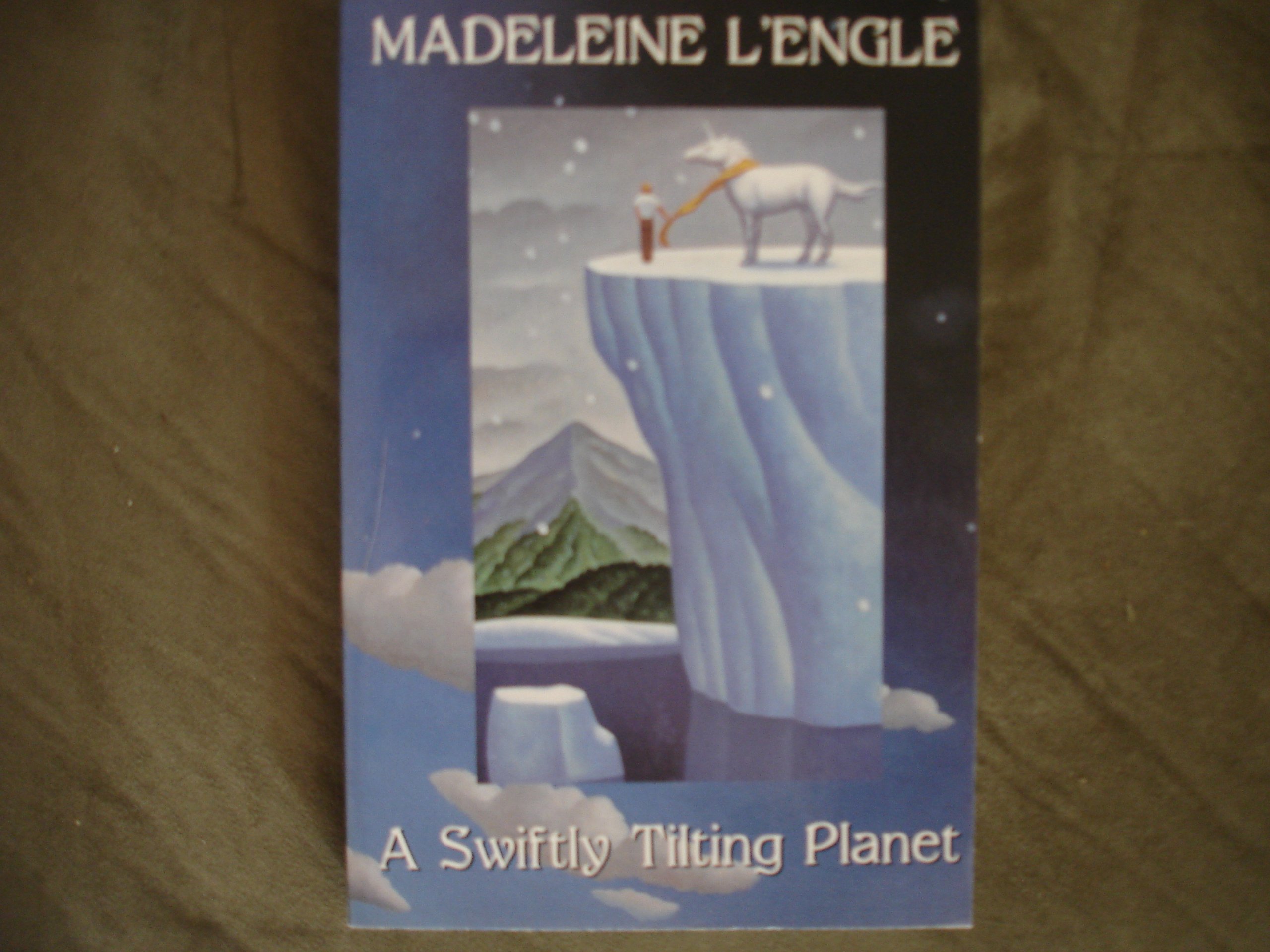 Swiftly Tilting Planet: Lengle, Madeleine: 9780965846851: Amazon.com: Books