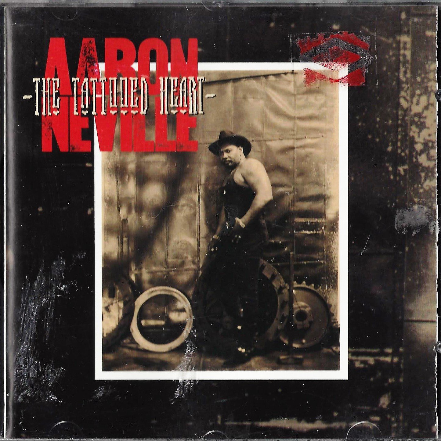 Tattooed Heart: Neville, Aaron: Amazon.ca: Music